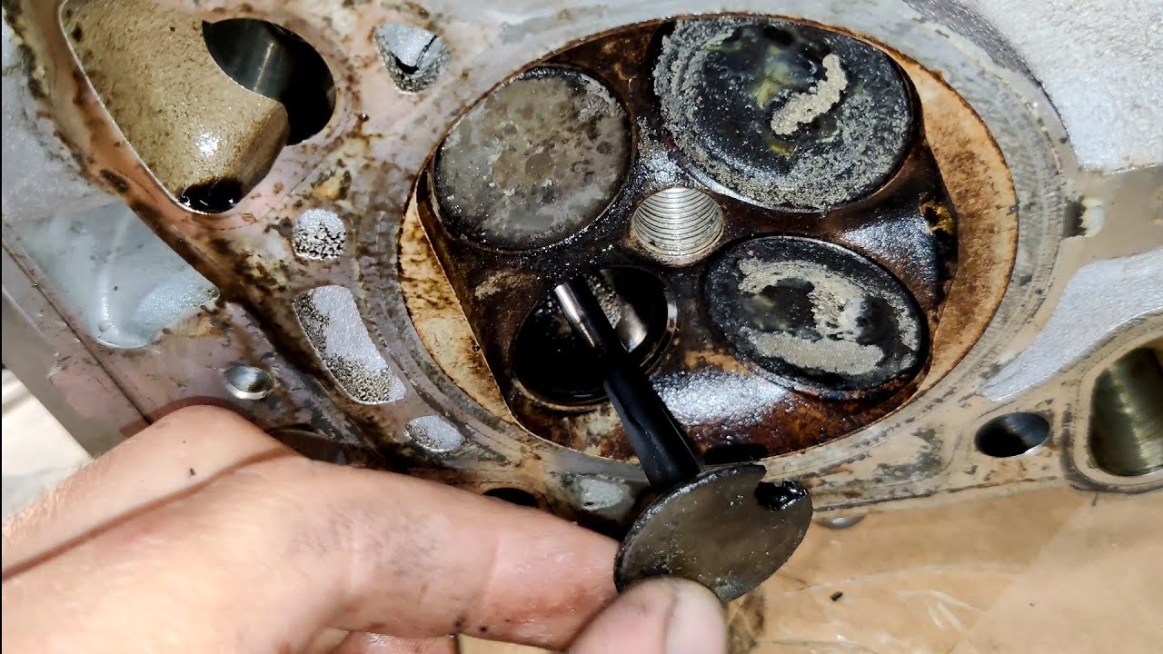 Cylinder head exhaust valve removal without special tool - YouTube