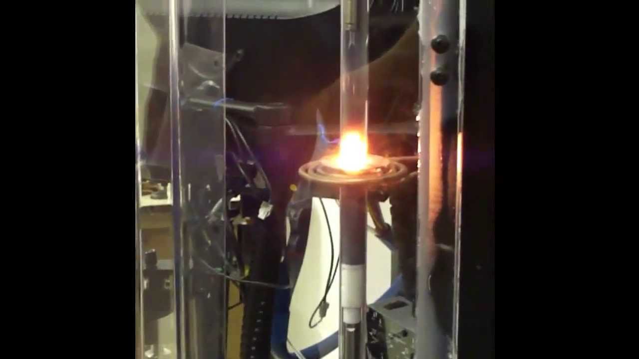 Pulling a polycrystalline silicon rod - YouTube