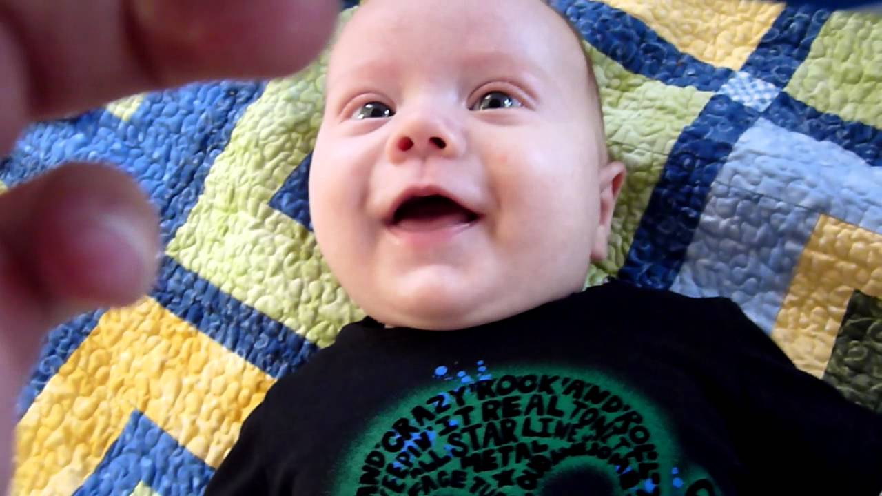 Henry coos at his reflection, plus a baby sneeze - YouTube