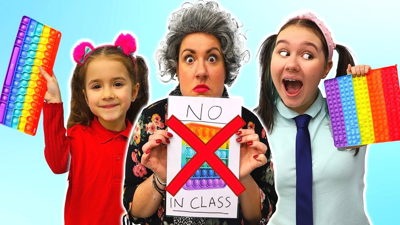 Ruby and Bonnie Learn Shapes With Pop It Toys - YouTube