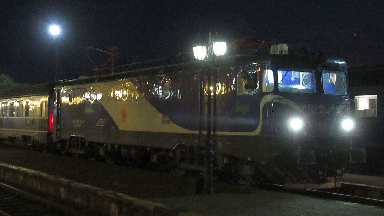 Romania: At Suceava, a CFR class 41 electric loco departs on Bucuresti ...