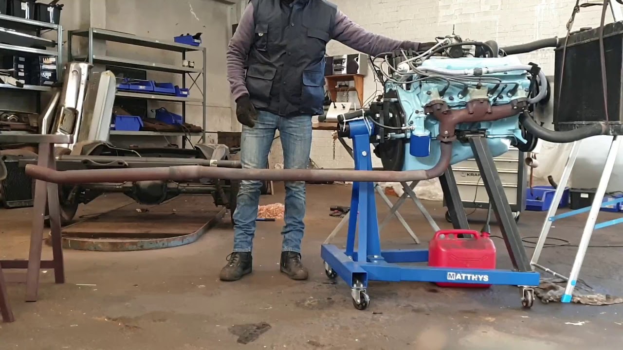 Pontiac 326 start on the engine stand. - YouTube