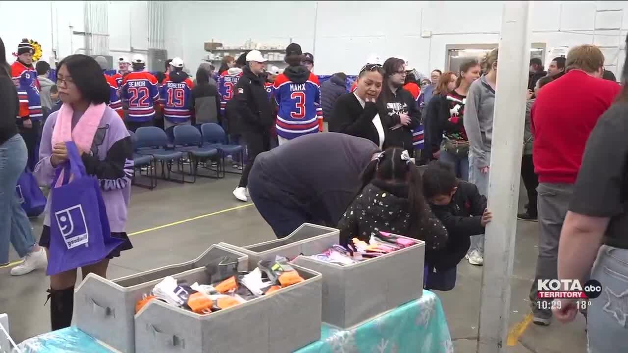 Goodwill puts smiles on kids faces for there annual Shoe Party - YouTube