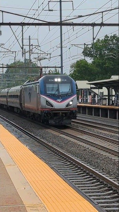 Amtrak Northeast Regional (Acs-64 #654) Dashes pass Princeton Junction with a Quiet Horn Salute ...