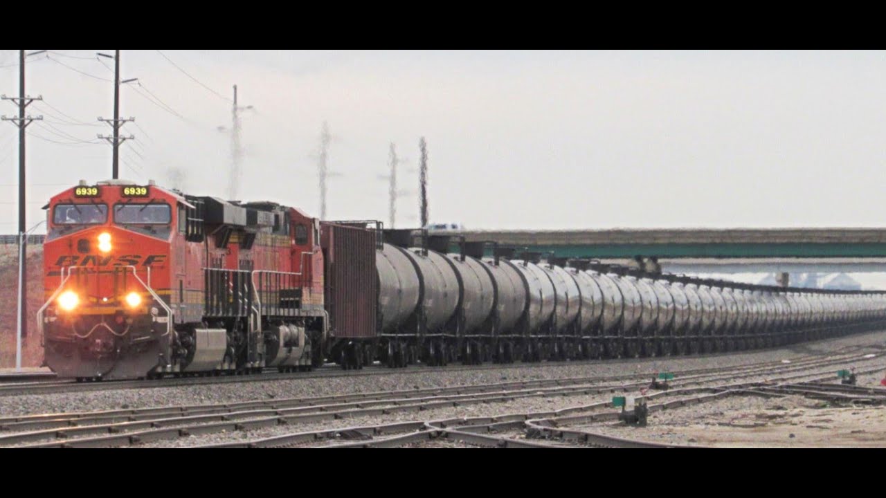 A windy day with a BNSF tank train - YouTube