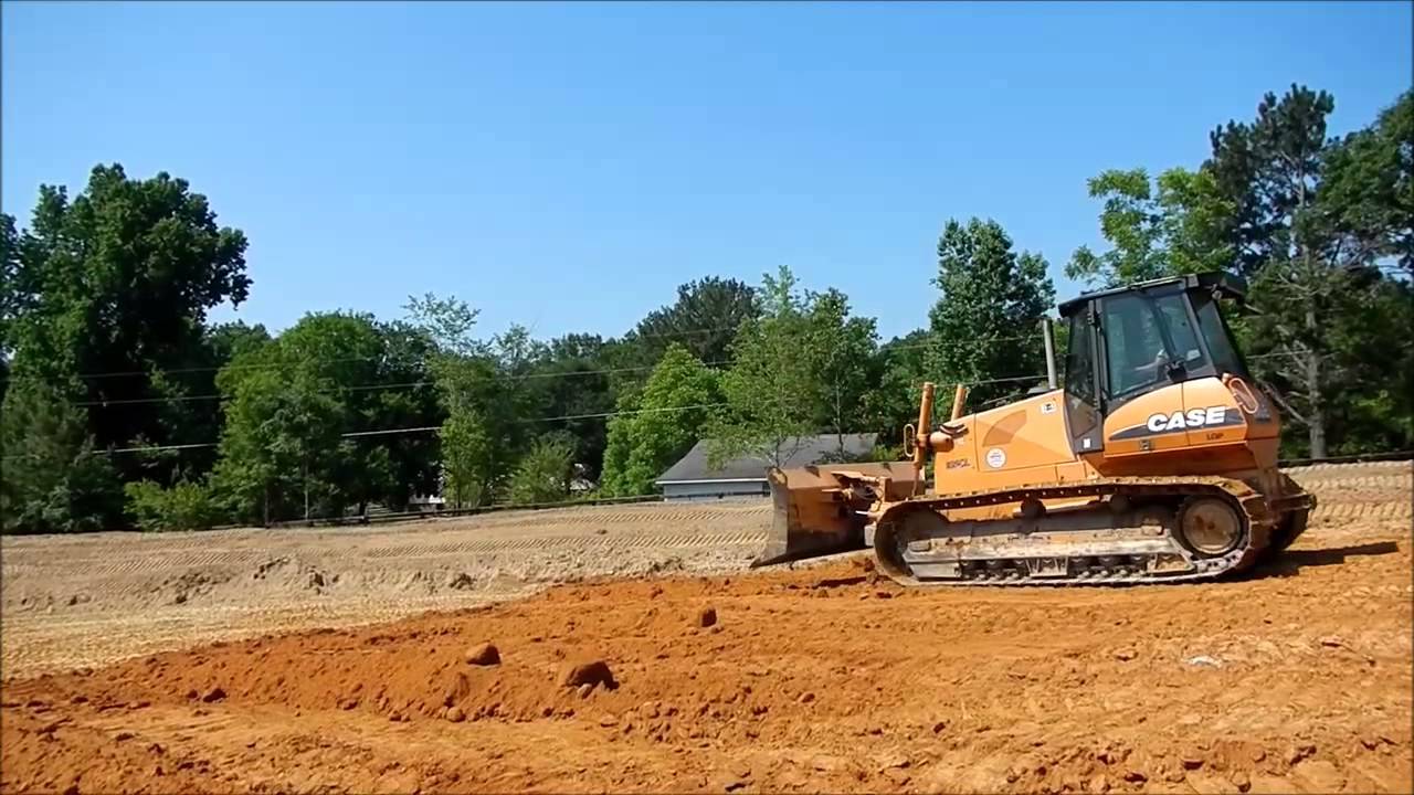 Case 1650L Dozer Pushing dirt - YouTube