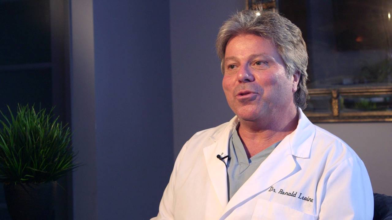 Largest possible breast implant Toronto Dr Ronald Levine - YouTube
