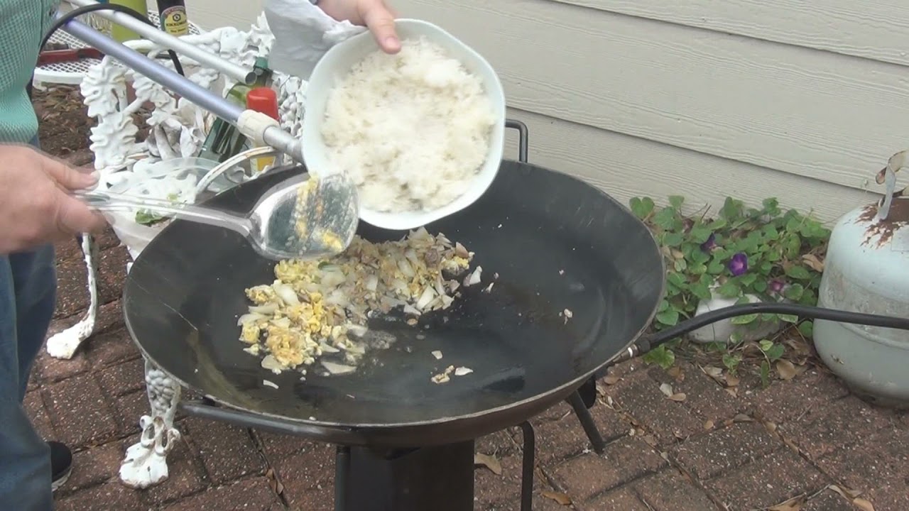 Rocket stove discada, plow disk, cowboy wok fried rice cooking - YouTube