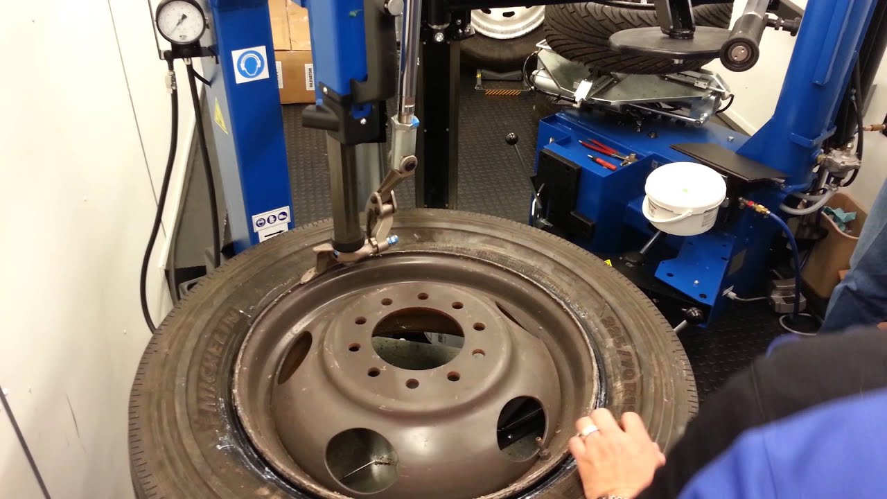 Rav tilt back tire changer with 19.5 tire - YouTube