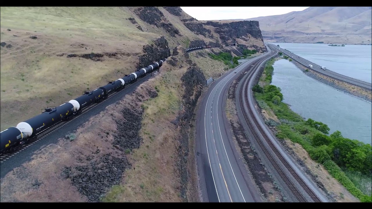 Drone Chasing BNSF oil train onto the Oregon Trunk at tunnel 1 (6/3 ...