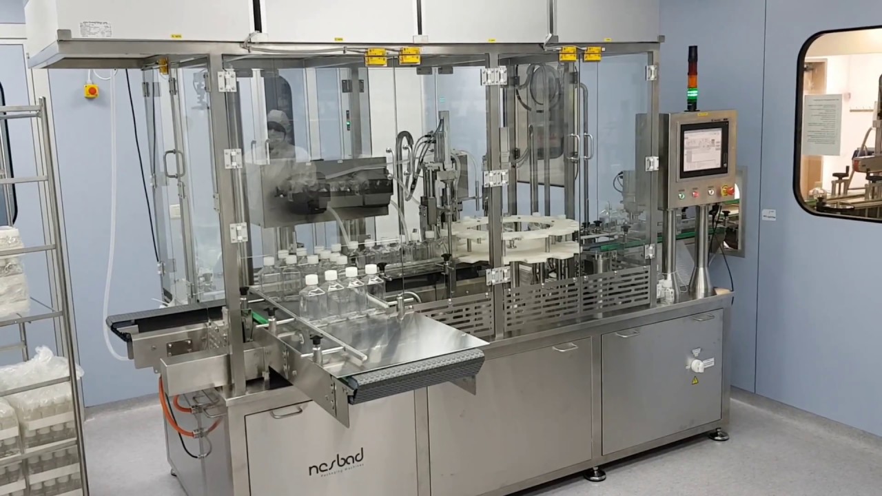 Clean room bottle filling and capping auto packaging machine - YouTube