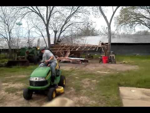 Tearing down a barn with a John Deere - YouTube
