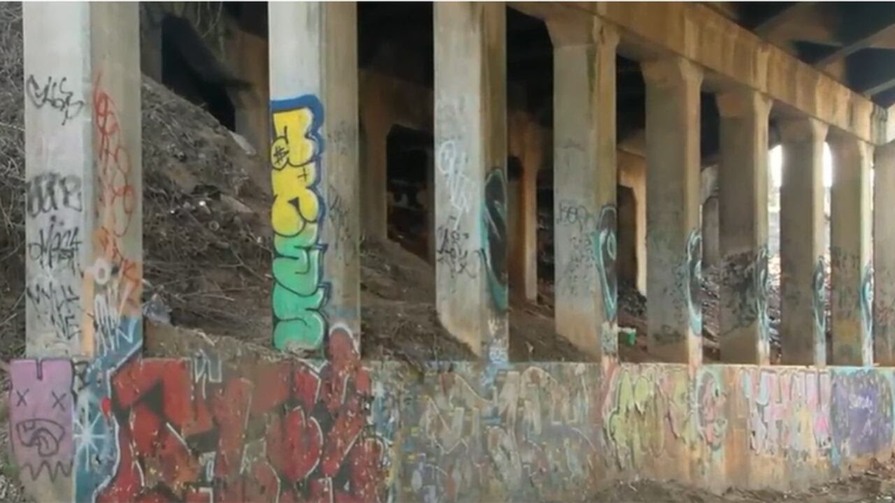 City of Atlanta cleans out homeless encampments under bridges - YouTube