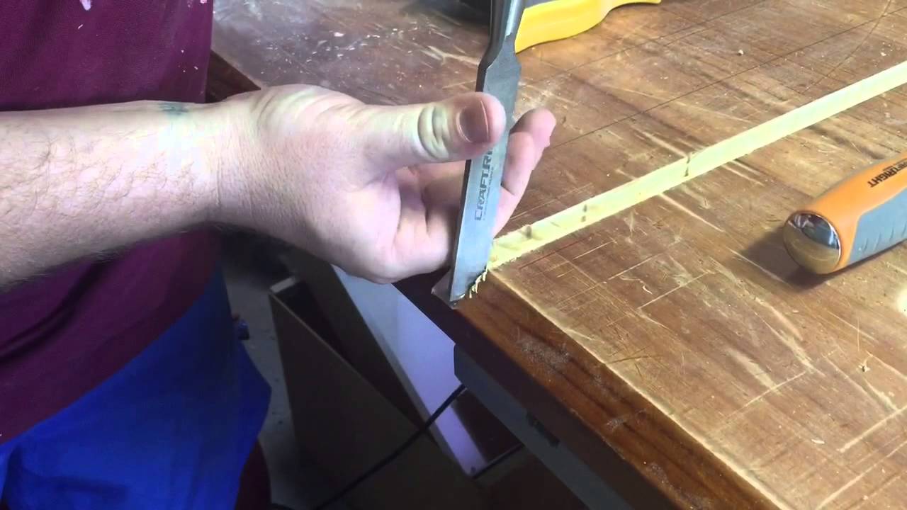 Routing mitre slots into custom table saw top - YouTube