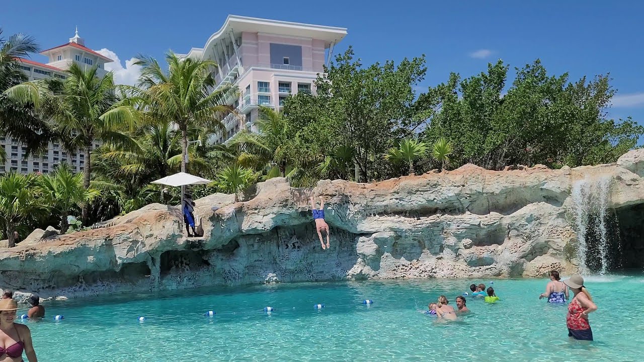 Jumping into pool at Baha Mar Resort on New Providence Island, Nassau ...