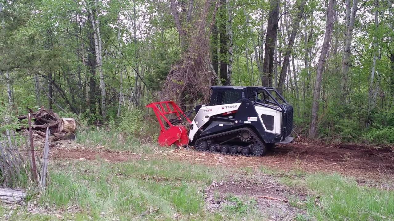Terex PT110 turning trees into mulch - YouTube
