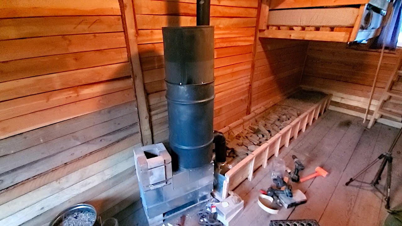 Uncle Mud Tiny House Rocket Mass Heater with Pebble Bench at Wheaton ...