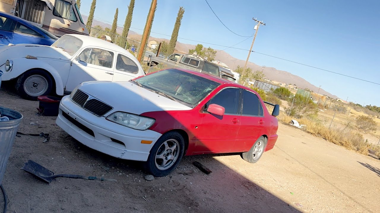 2003 Mitsubishi lancer oil pan replacement how to video - YouTube