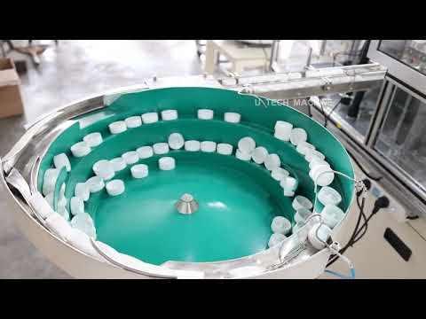 Bubble cap assembly machine - YouTube