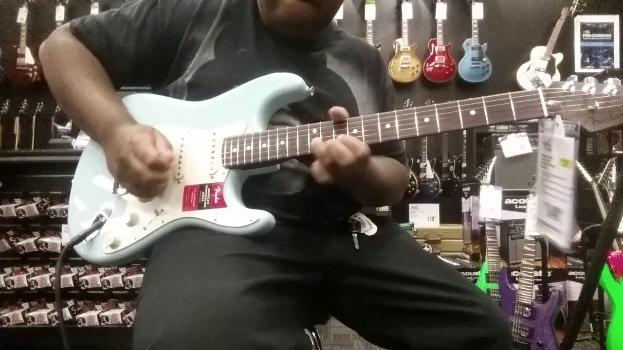 Playing a Fender Professional Series Stratocaster at Guitar Center in ...