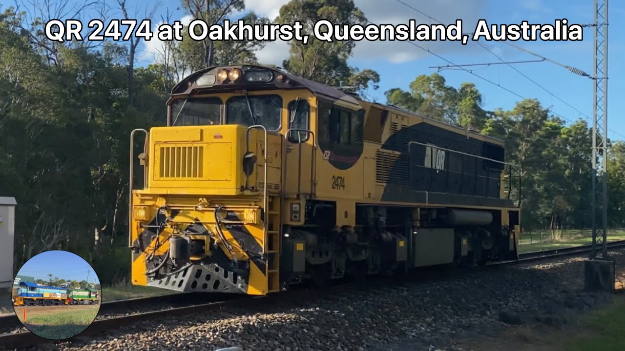Queensland Rail Light Engine 2474 crosses Nangarin Road, Oakhurst ...