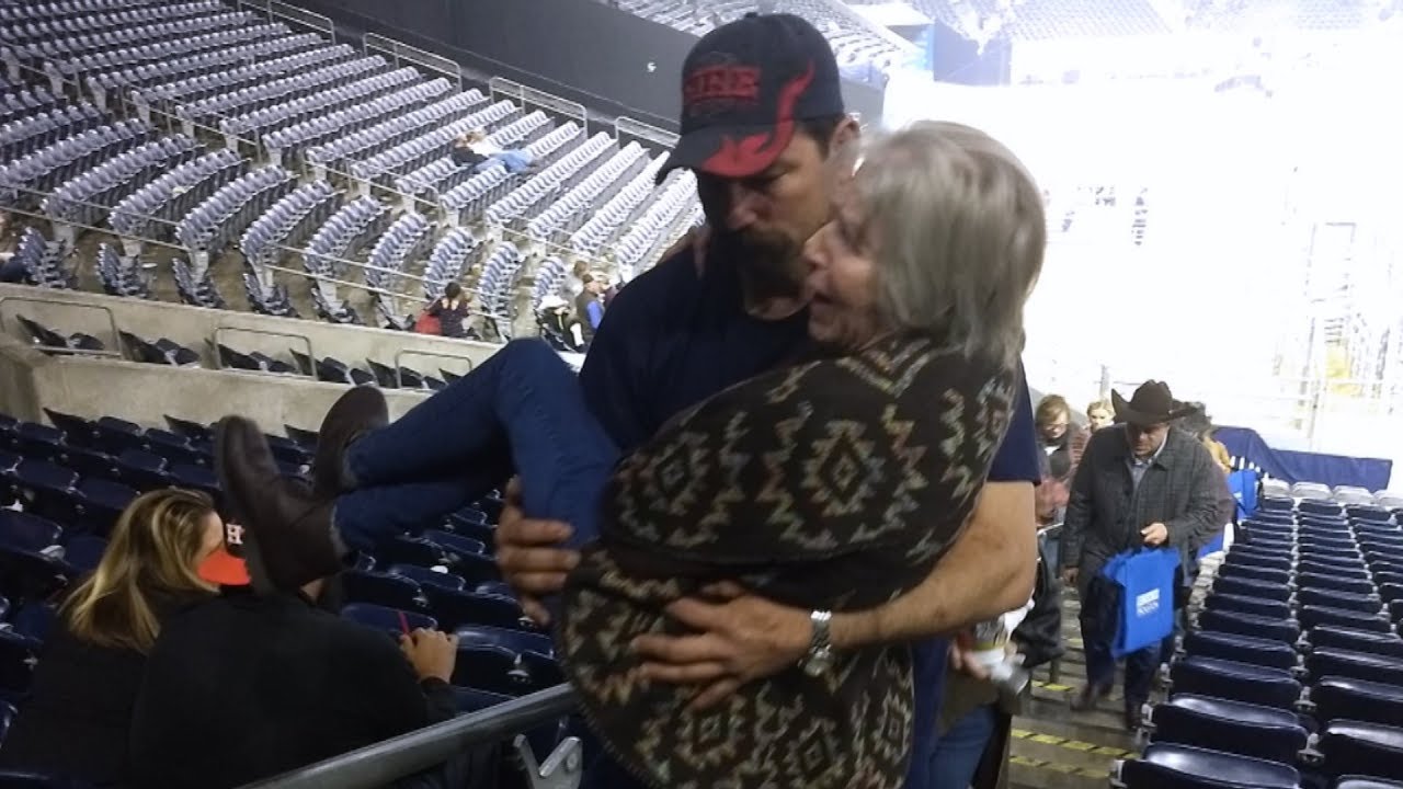 Watch Hero Firefighter Carry Struggling Elderly Woman Up Stadium Stairs ...