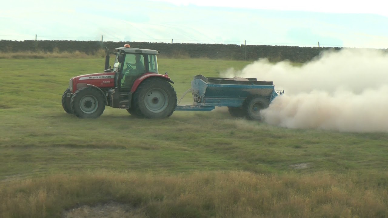 MF 6480 Spreading Lime on a rough Pasture 2/1/ 22 - YouTube