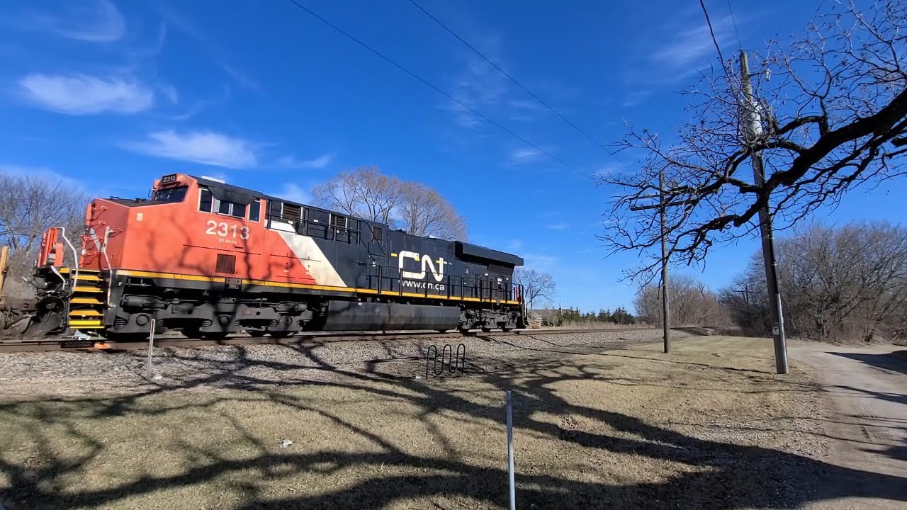 Northbound CN stack train with a DPU - YouTube