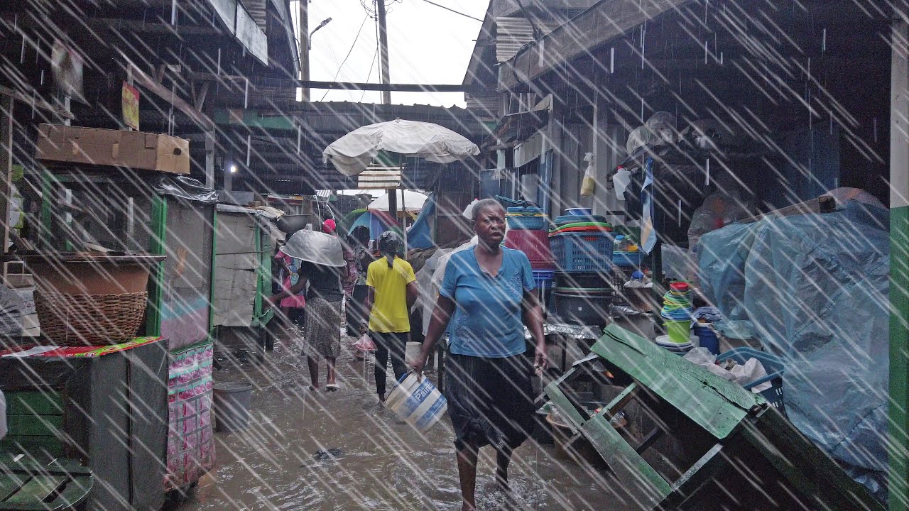 HEAVY RAIN FLOODS AFRICA MARKET IN GHANA - YouTube