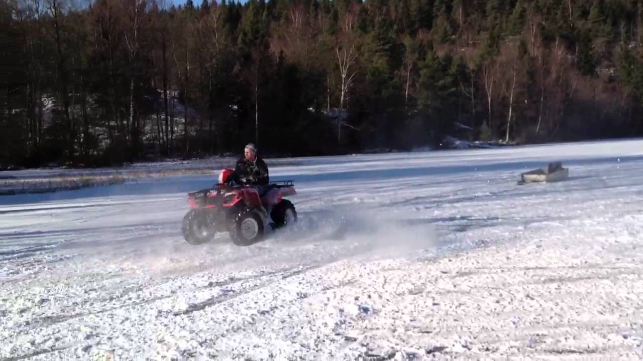 ATV Spinning on Ice - YouTube