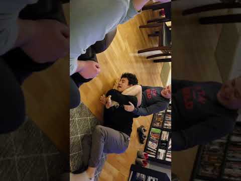 My son wrestling his aunt.