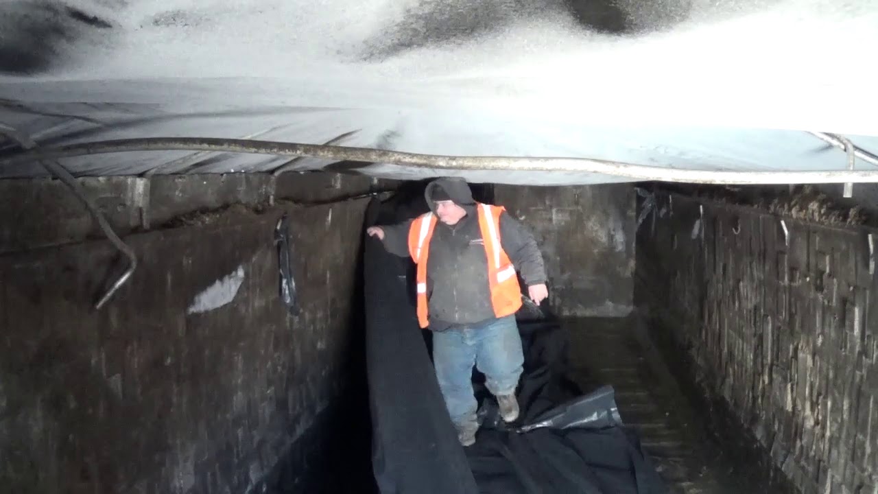 How to line your dump trailer with a plastic liner. - YouTube
