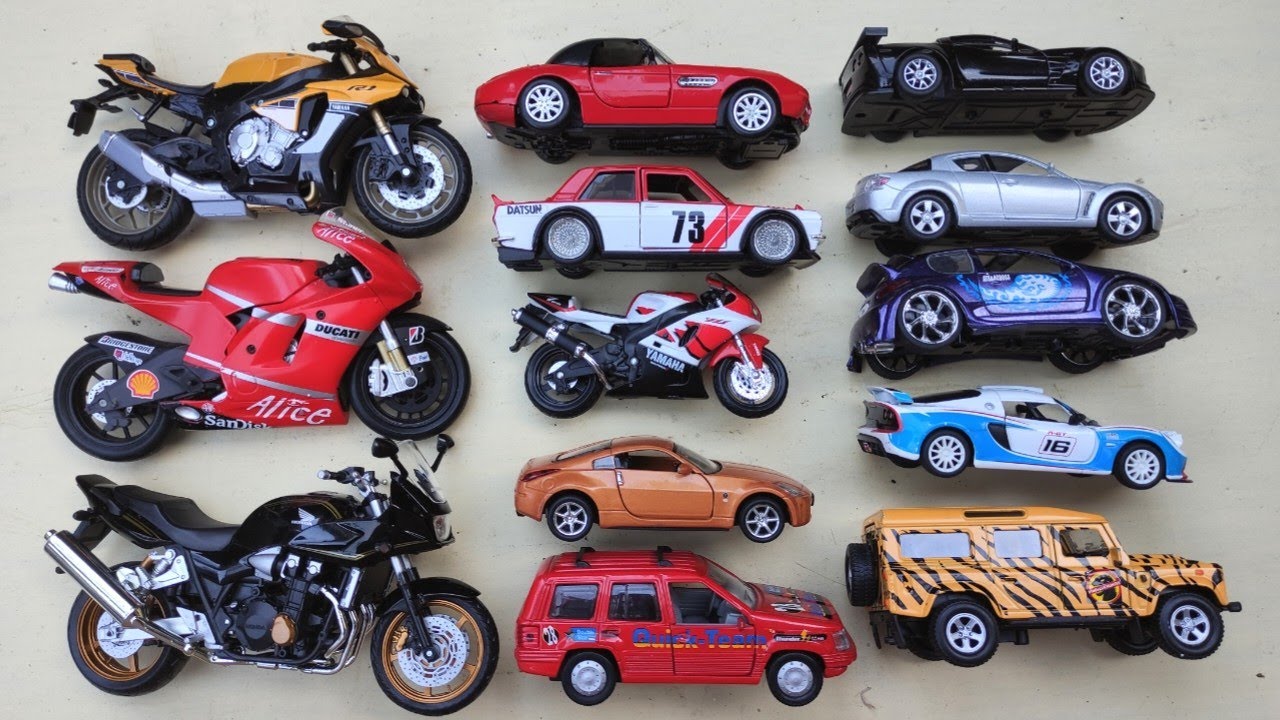 Big and Small Model Cars and Motorcycles Collection in Hands | Sport ...