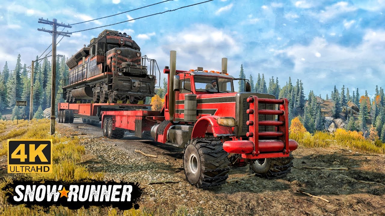 Peterbilt Oilfield Offroad Truck Towing a Train on Mudding Road In ...