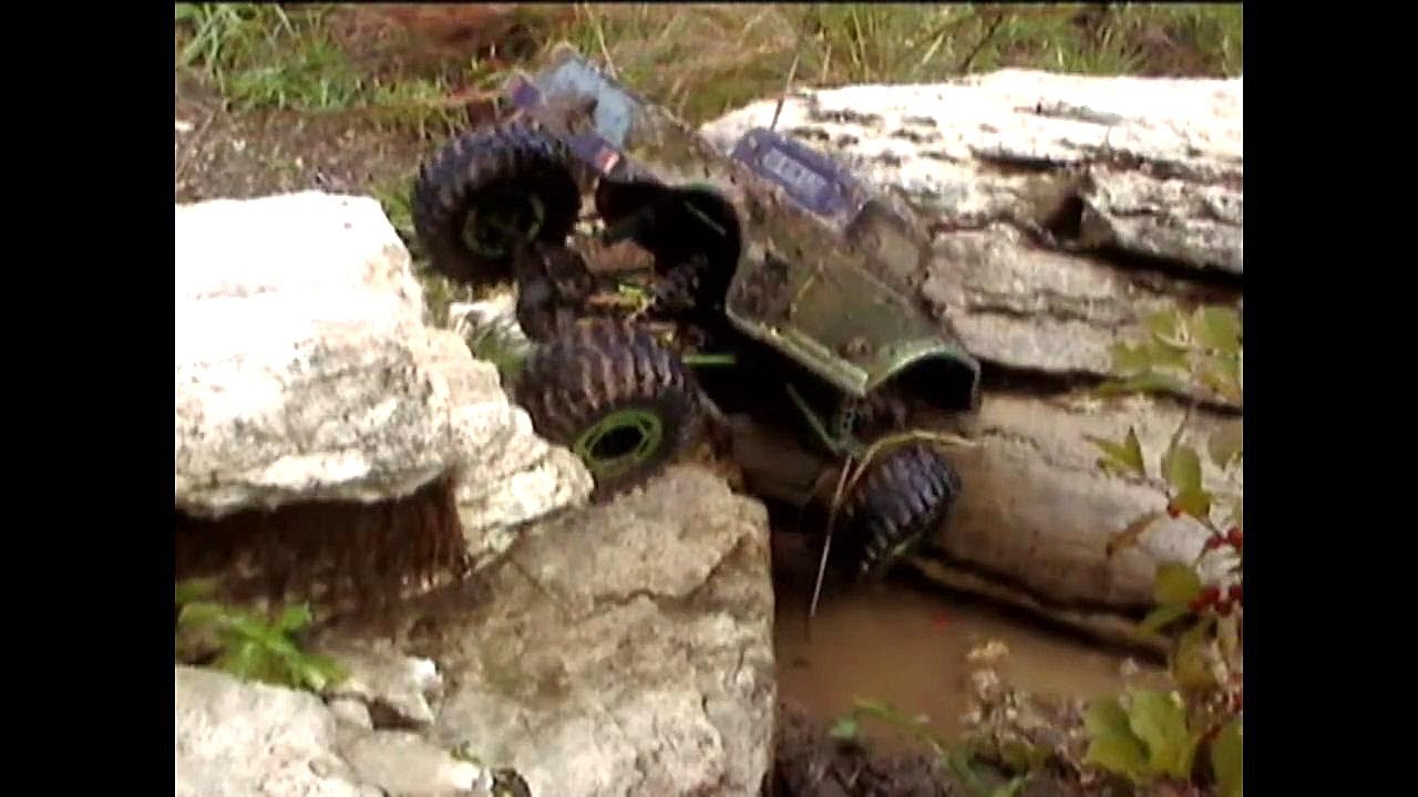 Waterproof Axial AX-10 Scorpion Rock-Crawling In The Mud And Rain ...