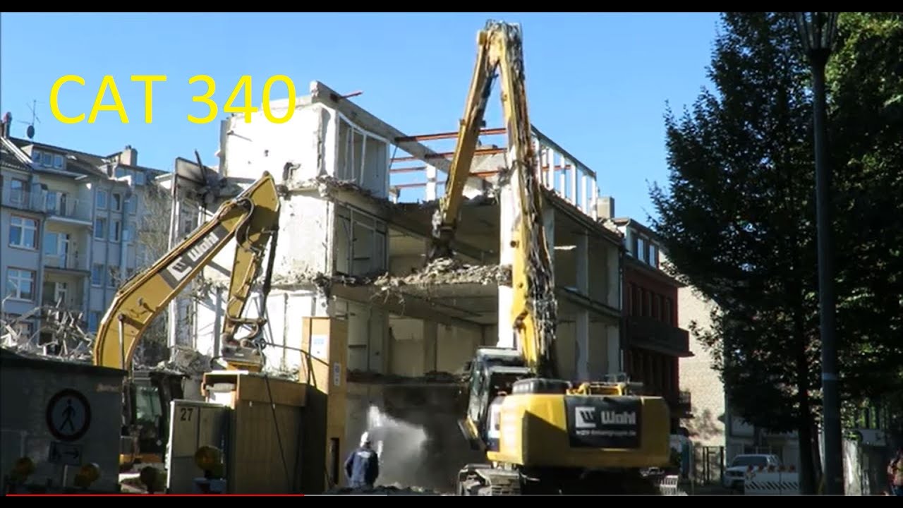 Excavator CAT 340F demolition site (Summer) - YouTube