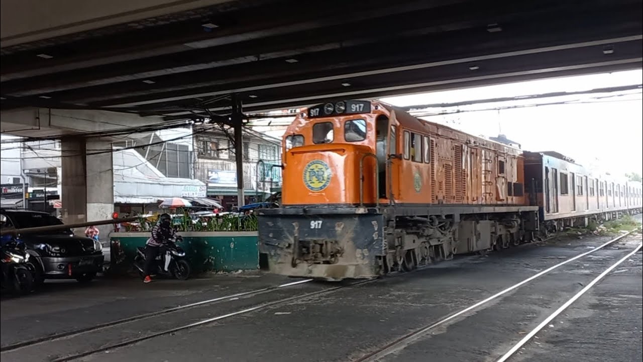 PNR DEL 917 with 203 Series EMU 5 passing Rizal Avenue (Blumentritt ...