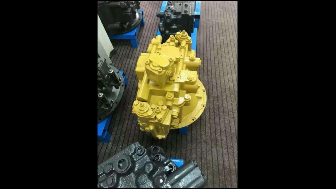 Caterpillar 312C 315C hydraulic pump - YouTube
