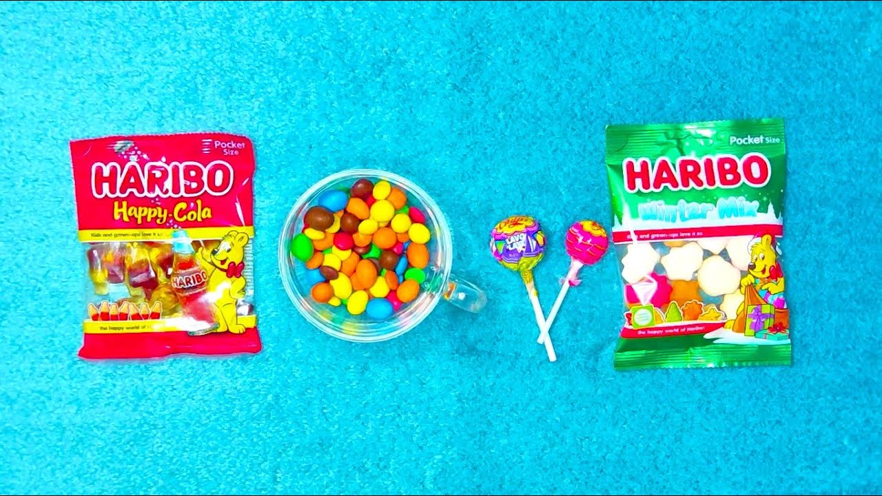 Unpacking sweets ASMR | Haribo winter, Haribo Cola, lollipops, M&Ms ...