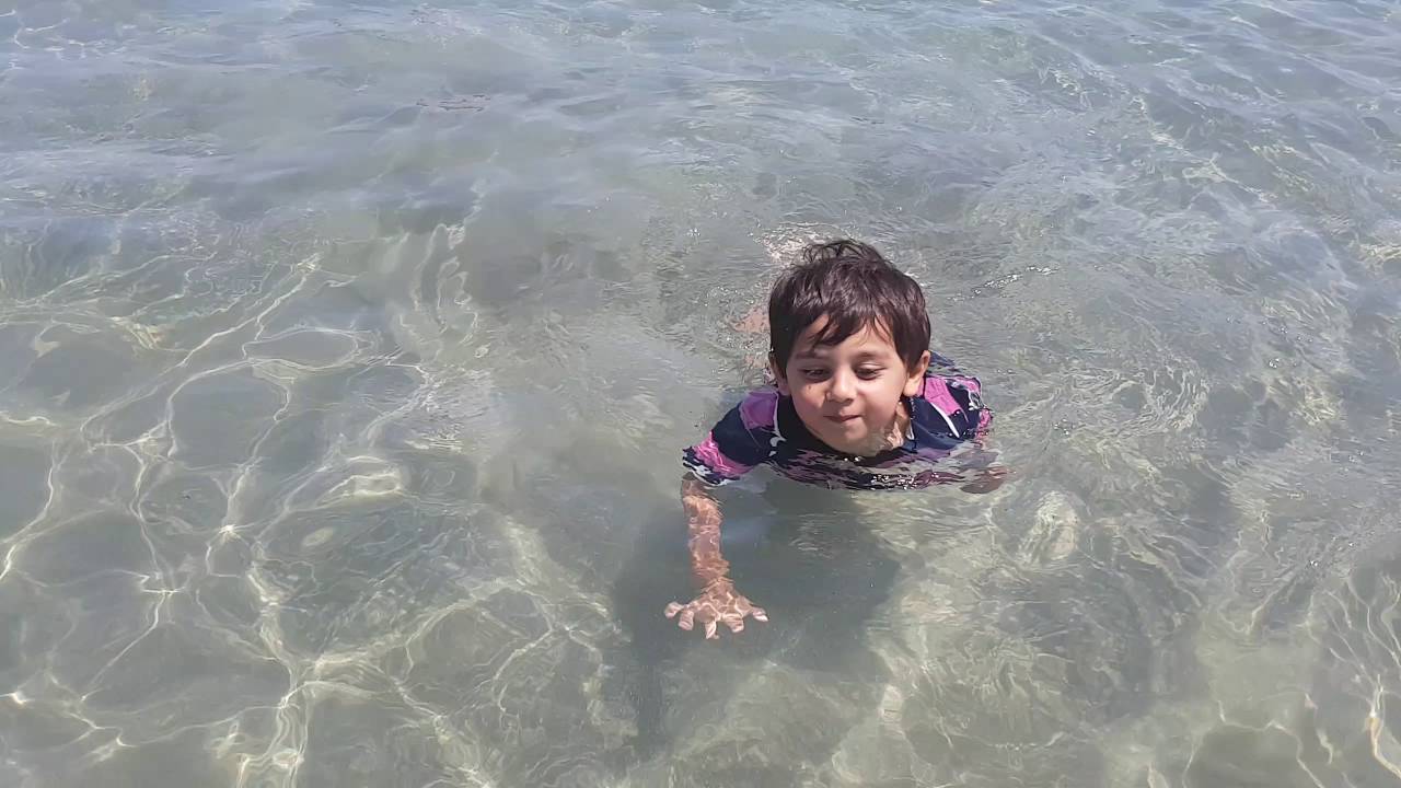 Fully clothed, swimming in the sea at Javea - YouTube