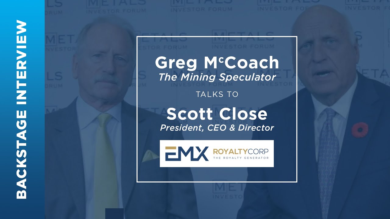 Scott Close of EMX Royalty Corp. talks to Greg McCoach at the November ...