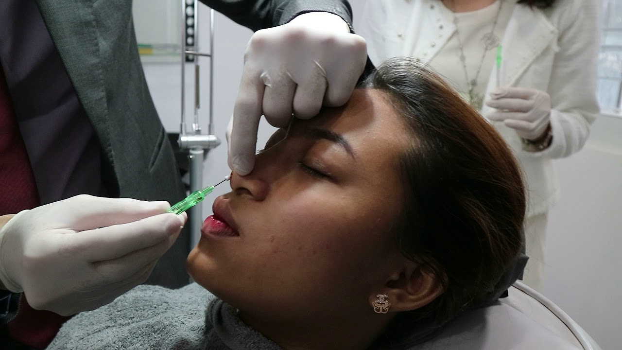 Dr Chua Cheng Yu trains foreign doctors on nose threads - YouTube