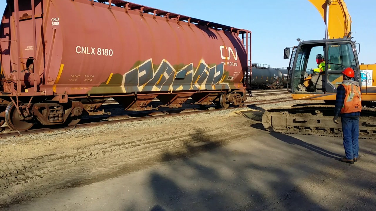 Excavator flips Train over!! - YouTube