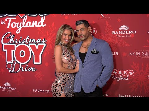Shekinah Garner and Sarper Guven 17th Annual Babes in Toyland Christmas Toy Drive Red Carpet