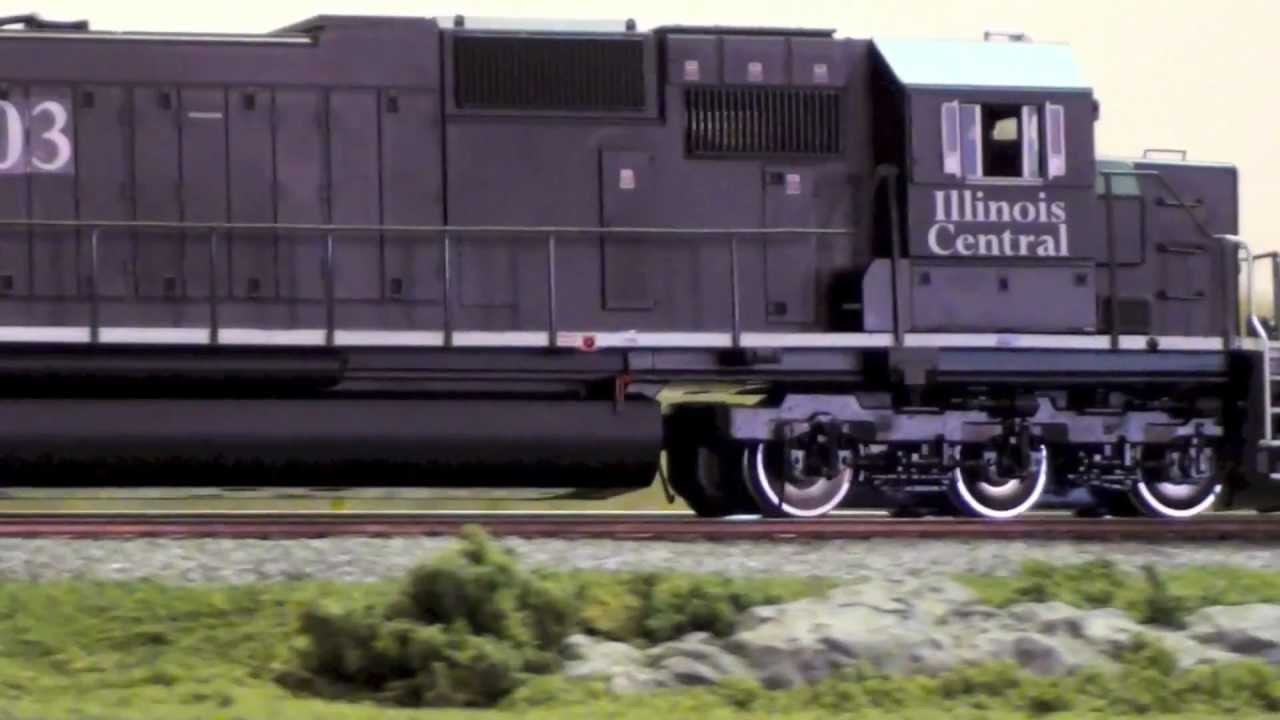 HO Illinois Central SD70 & CN SD75i Pulling Mixed Freight - YouTube