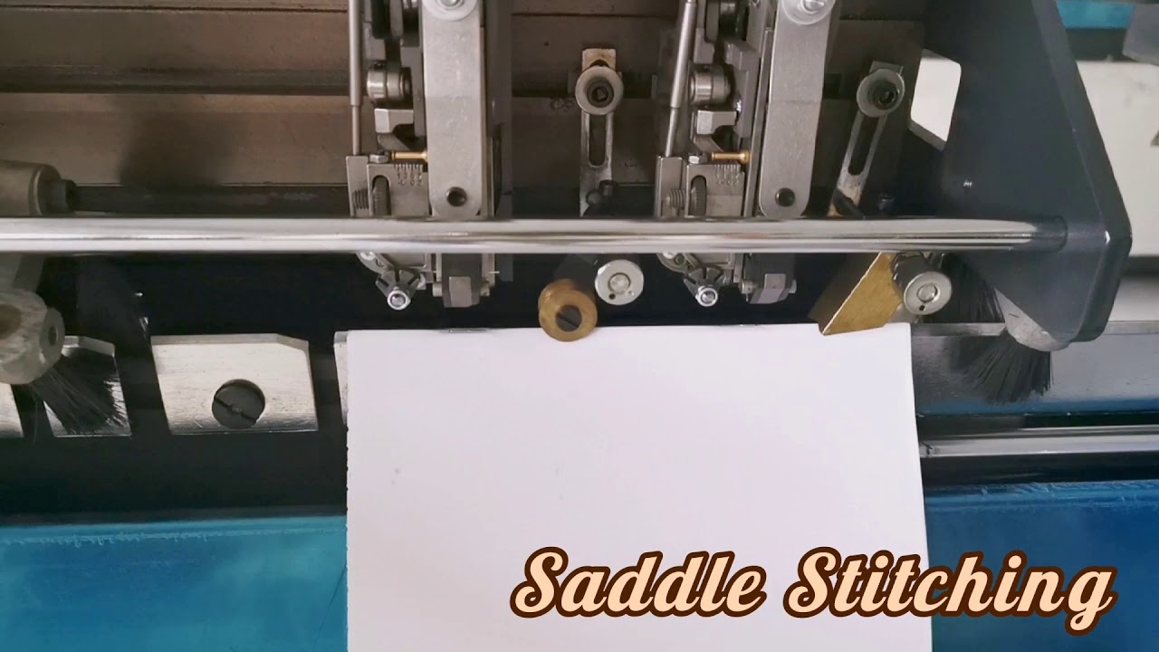 Saddle stitching machine - YouTube