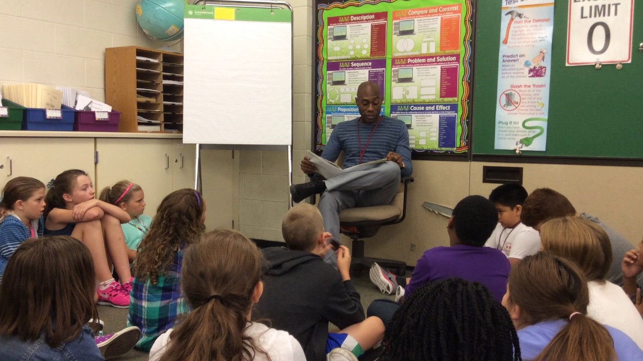 Mr. Fisher reads the book "The Monster Who Ate My Peas" to 5th grader ...