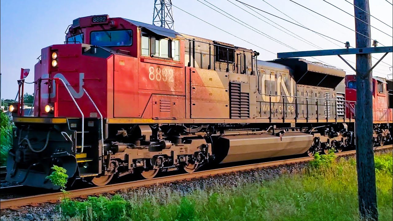Long CN train at Beaconsfield Station - YouTube