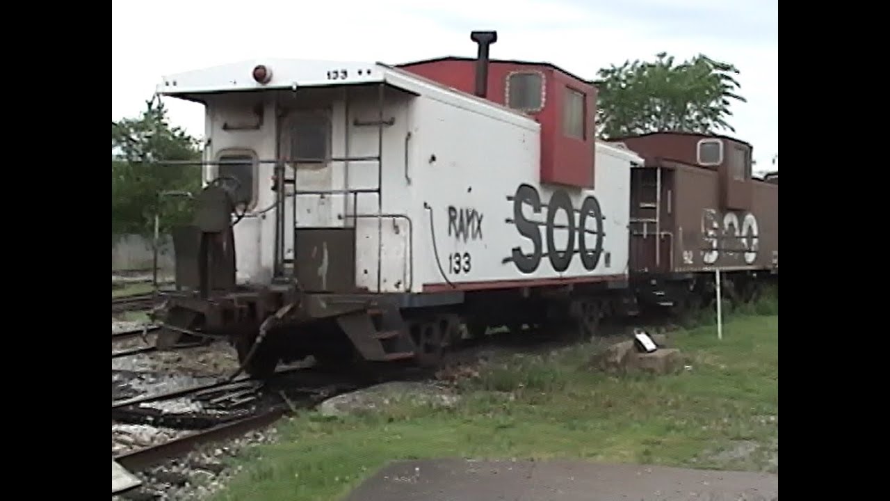 Soo cabooses, Amtrak mail cars on Fairfield, IA sidings 5/13/05 - YouTube