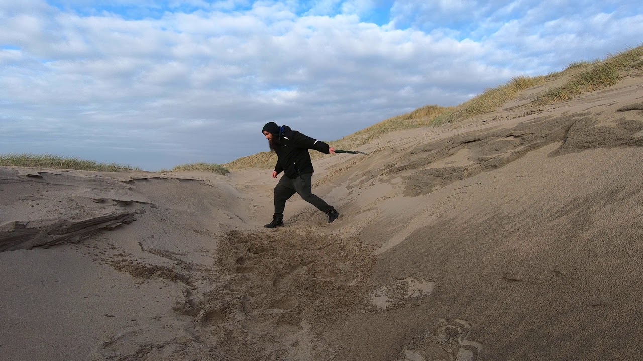 Sideways throws of a military shovel with a triangle shaped handle ...